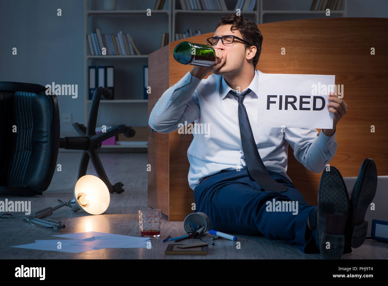Employee fired during crisis drinking in stress and despair Stock Photo ...