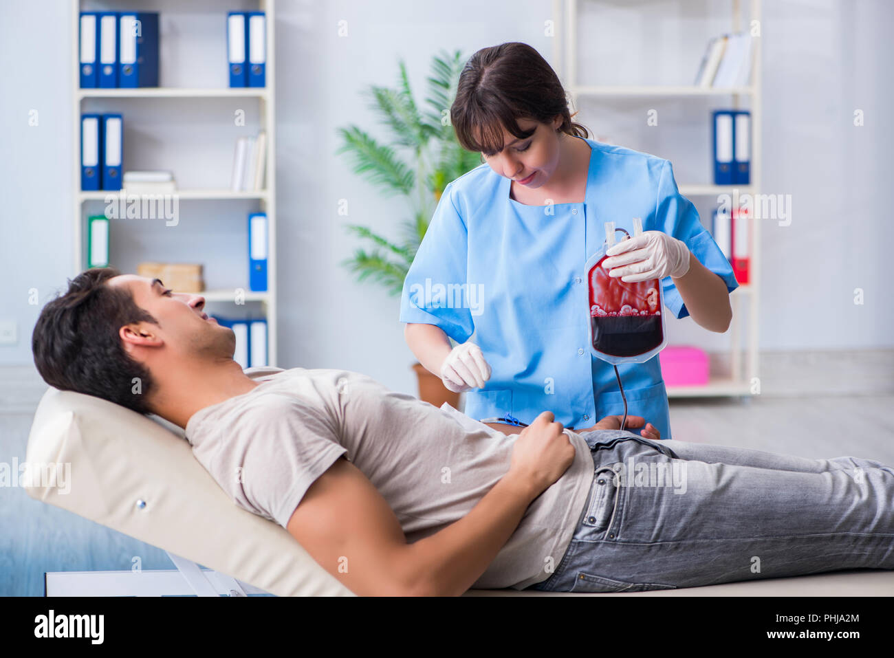 Patient getting blood transfusion in hospital clinic Stock Photo - Alamy