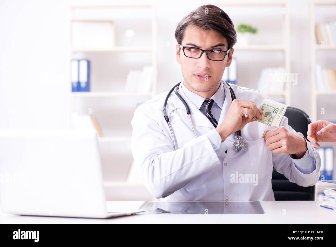Doctor money envelope hi-res stock photography and images - Alamy
