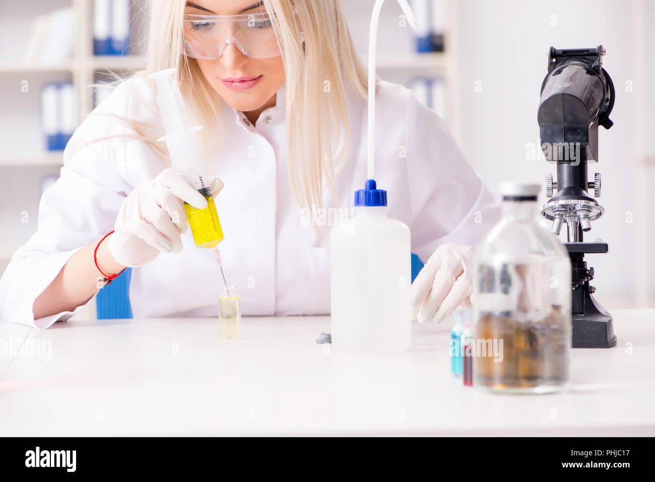 Young female woman doctor in hospital clinic lab Stock Photo - Alamy