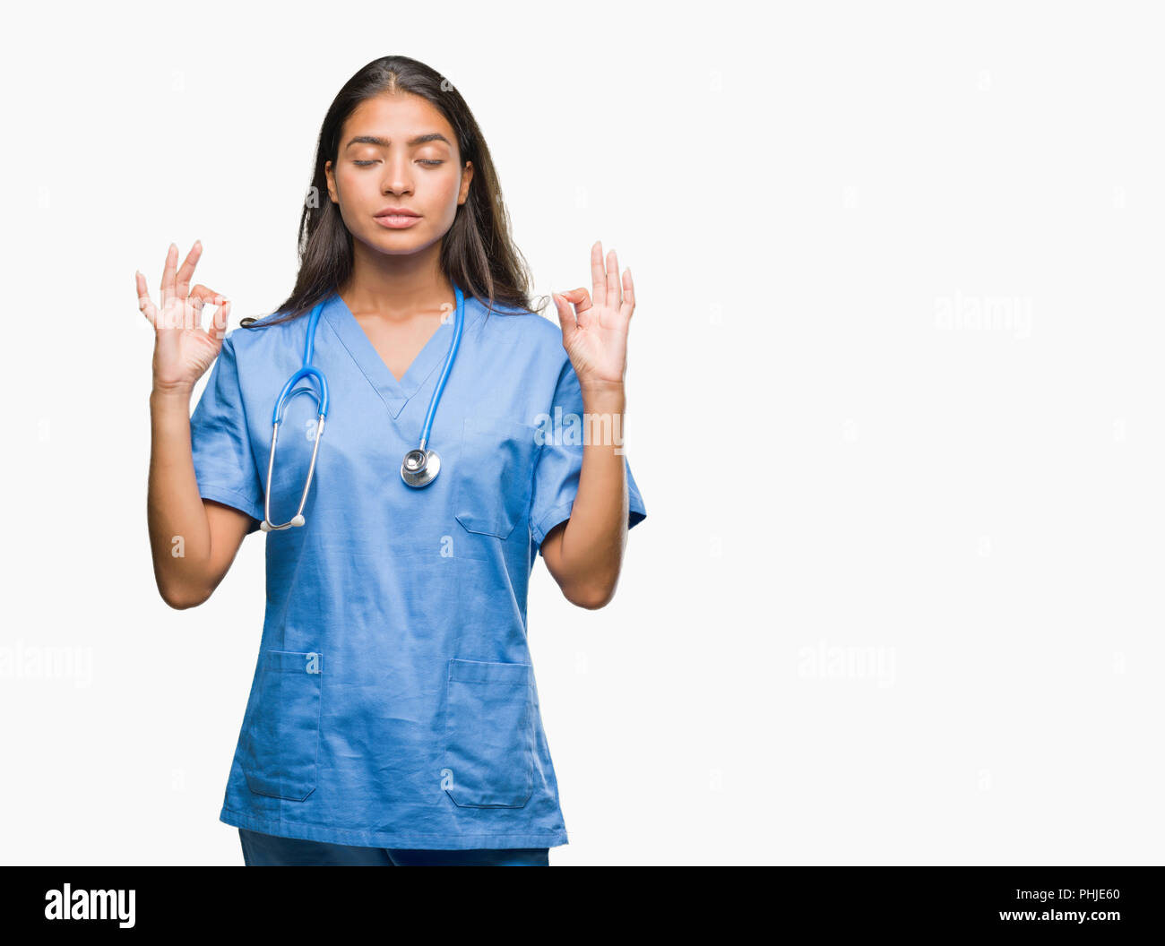 Young arab doctor surgeon woman over isolated background relax and ...