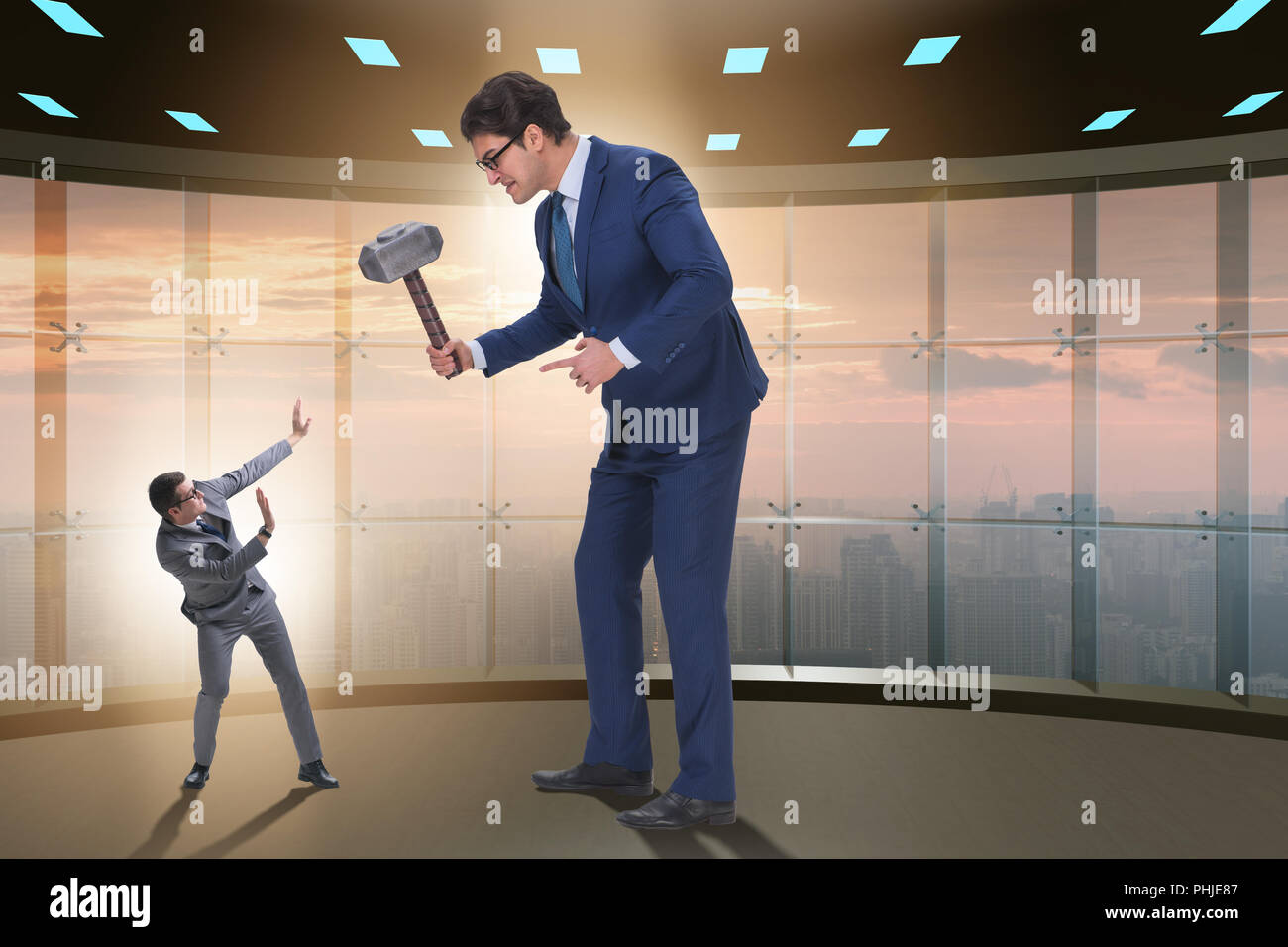 Bad angry boss threatening employee with hammer Stock Photo - Alamy