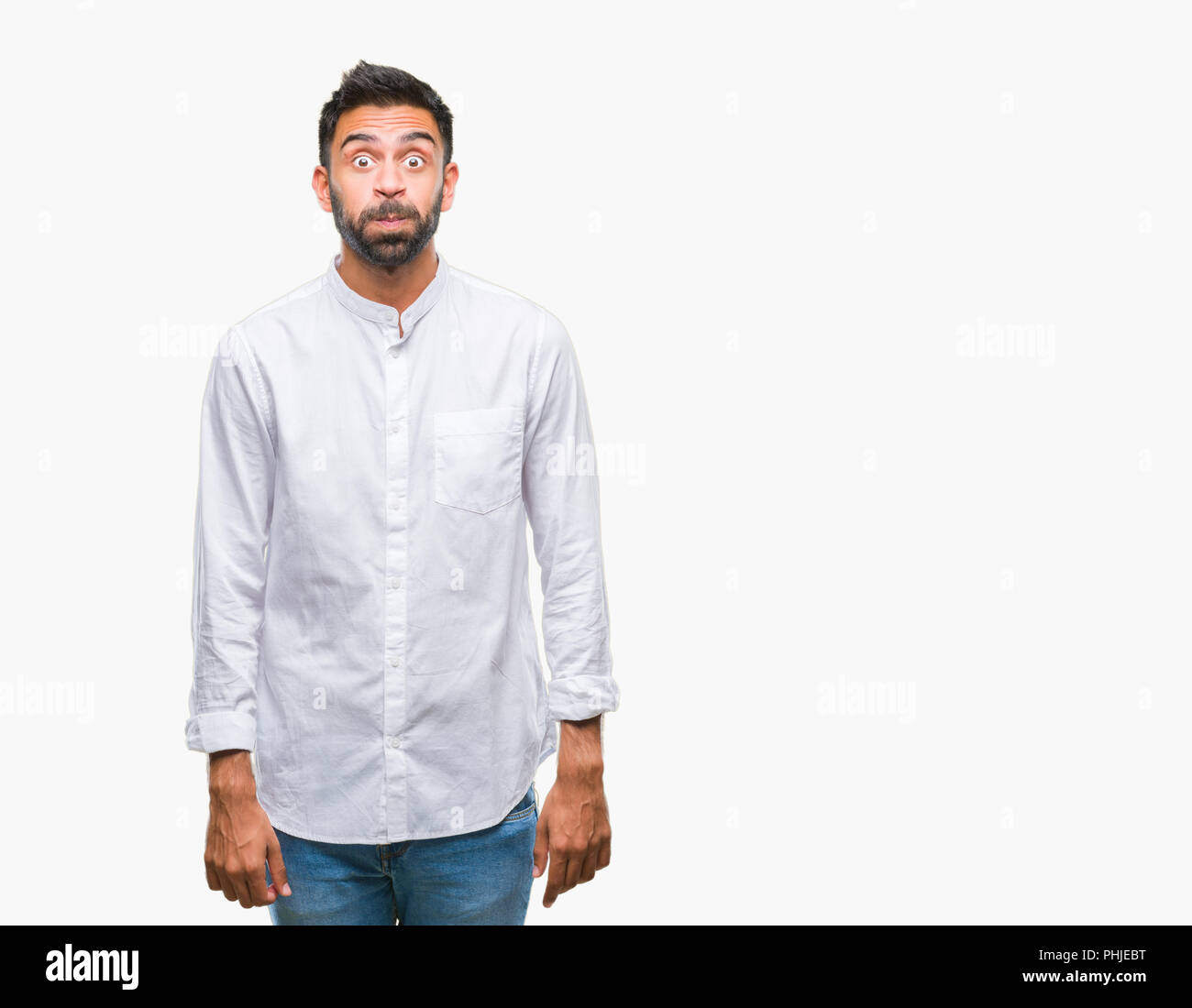 Adult hispanic man over isolated background puffing cheeks with funny ...