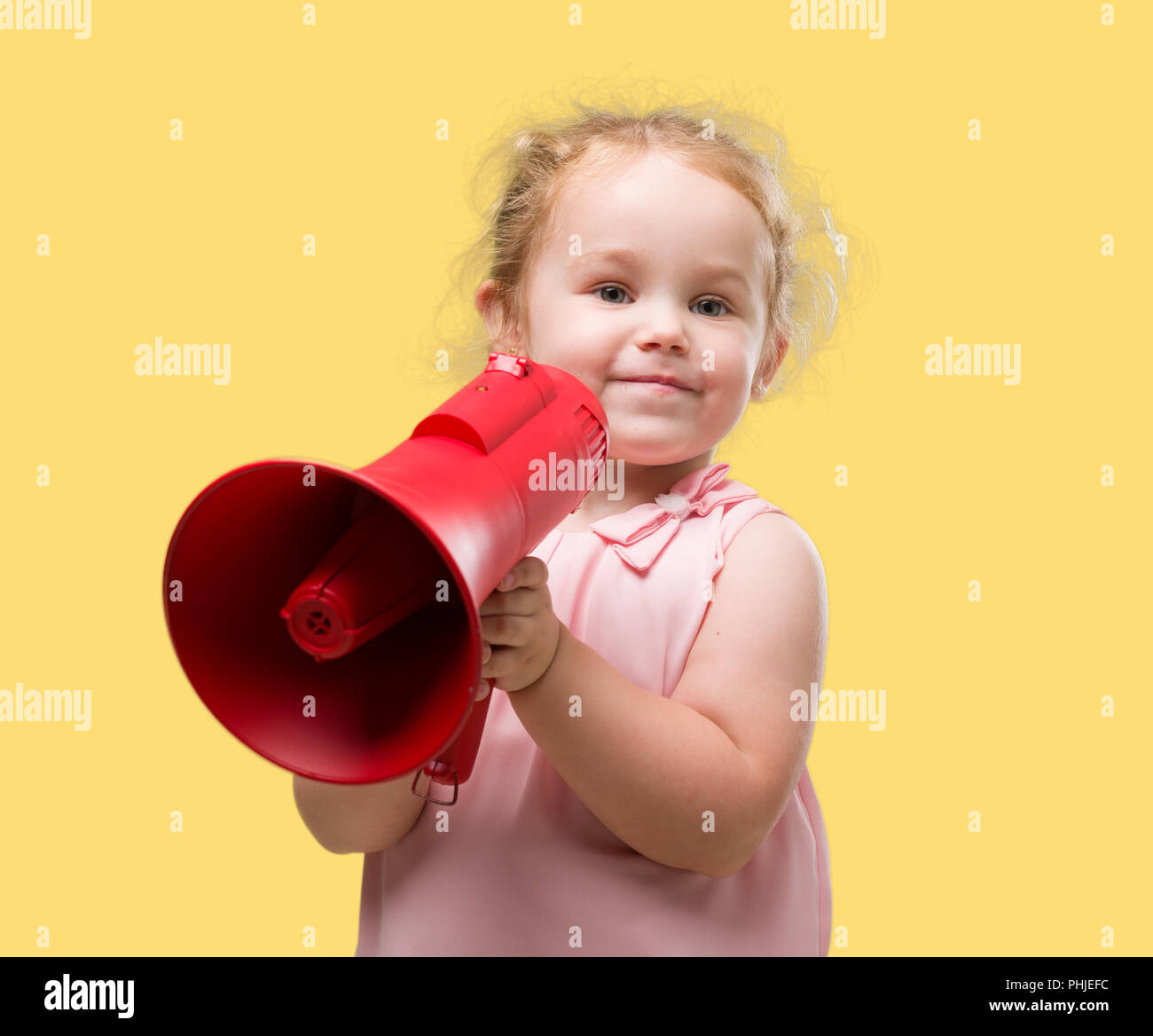 Kid shouting through megaphone hi-res stock photography and images - Alamy