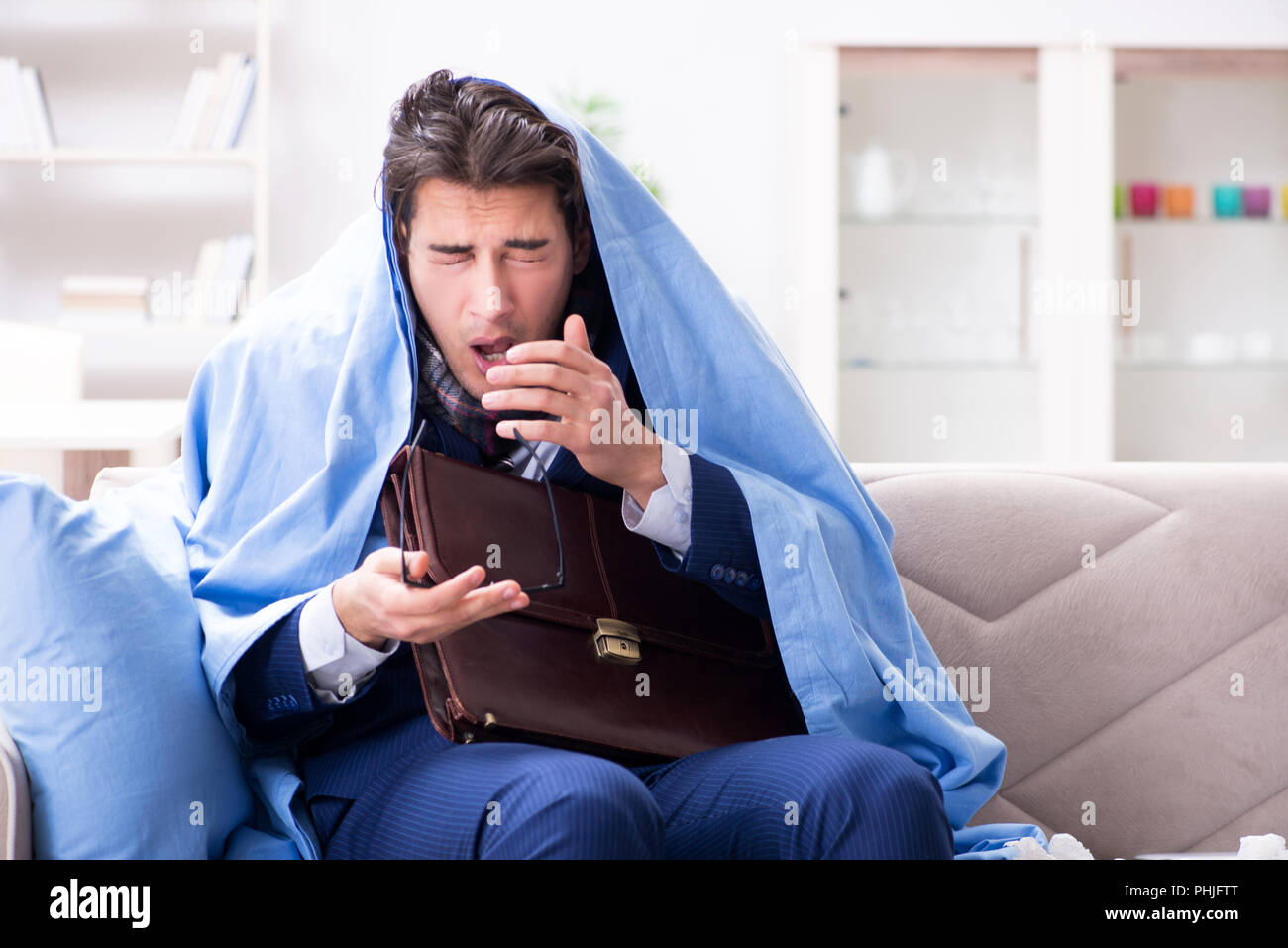 Sick employee staying at home suffering from flue Stock Photo - Alamy