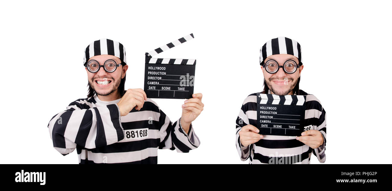 Funny prison inmate with movie board isolated on white Stock Photo - Alamy