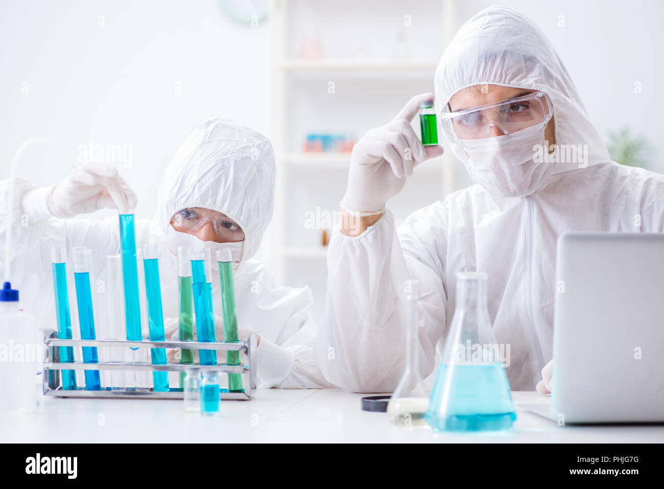 Two scientists working in the chemical lab Stock Photo - Alamy