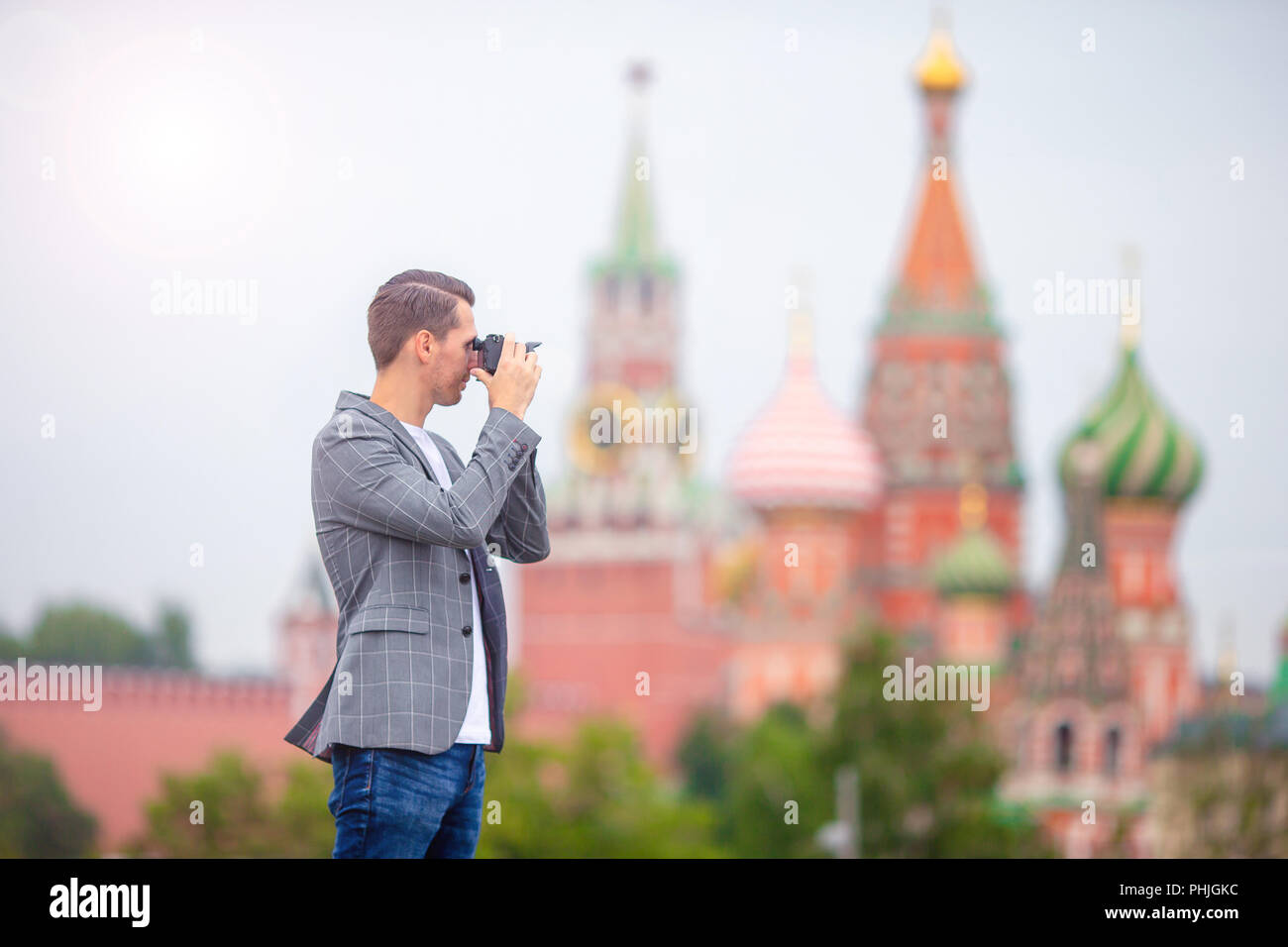 Professional photographer taking a city photo Stock Photo - Alamy