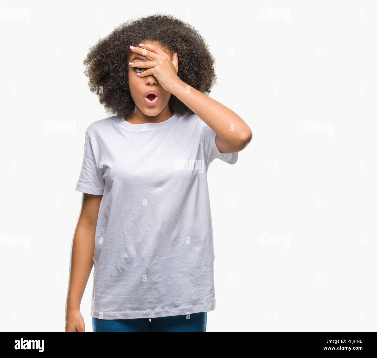 Hand over eyes peeking woman hi-res stock photography and images - Alamy