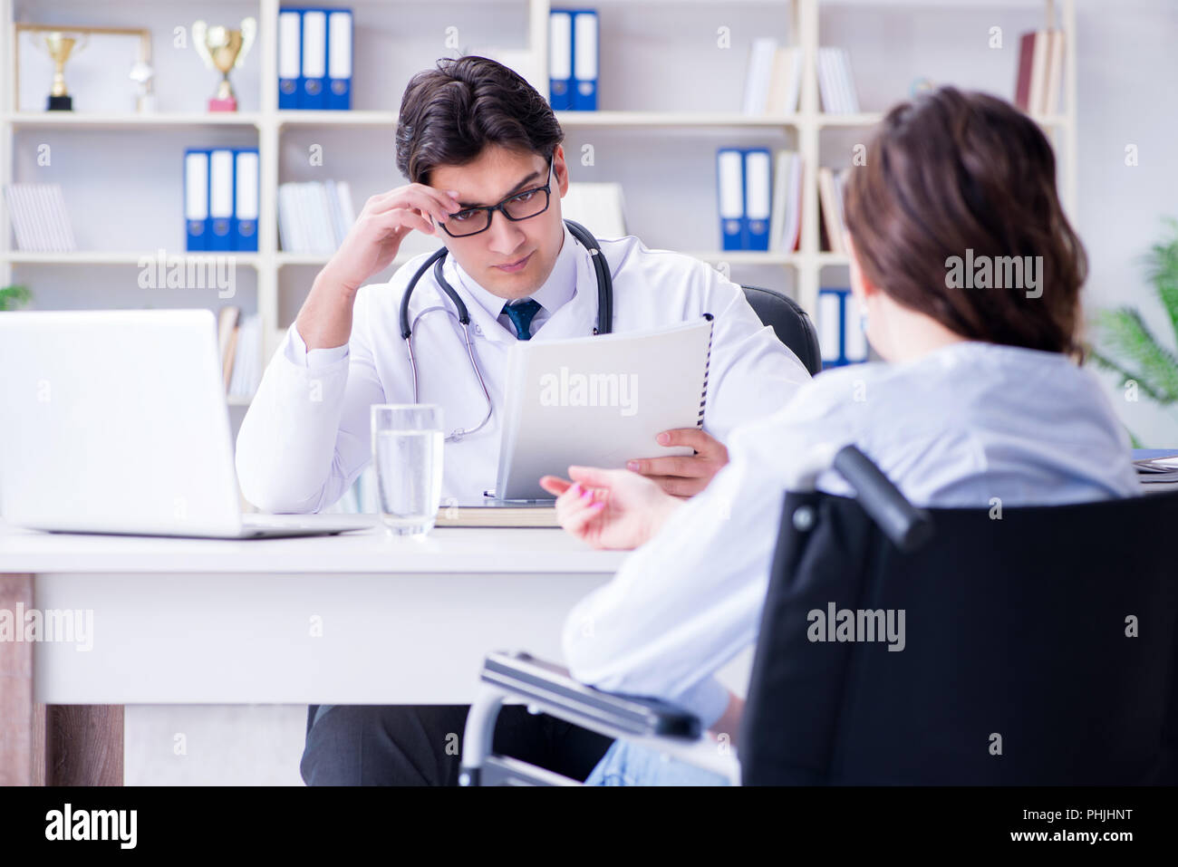 Doctor sharing discouraging lab test results to patient Stock Photo - Alamy