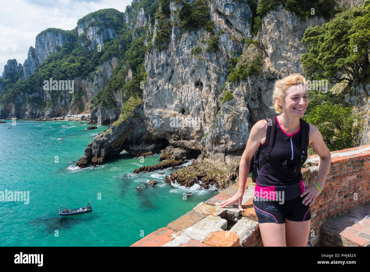 Woman in the coastal cliffs Stock Photo - Alamy