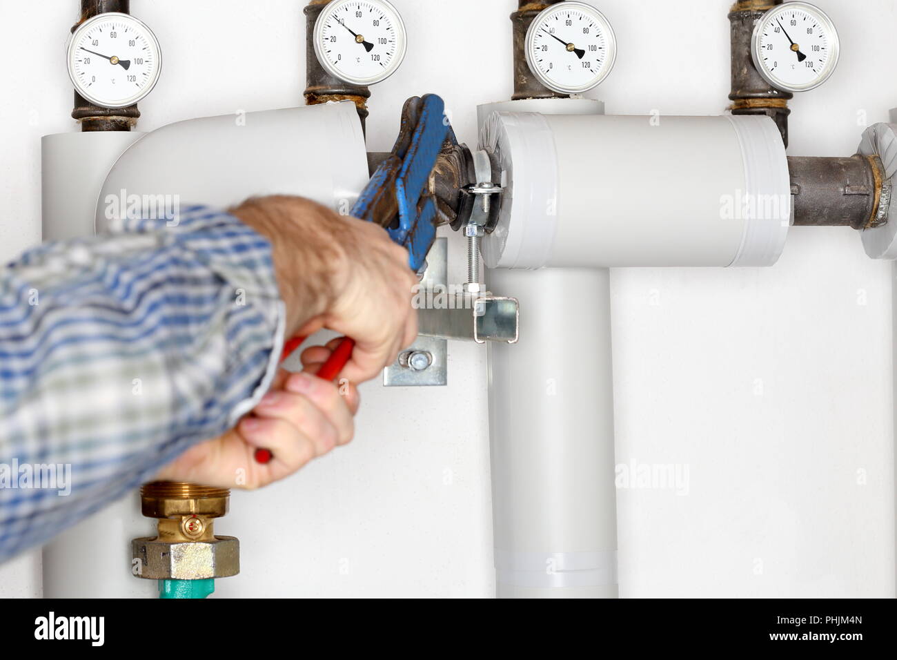 working on pipes Stock Photo - Alamy