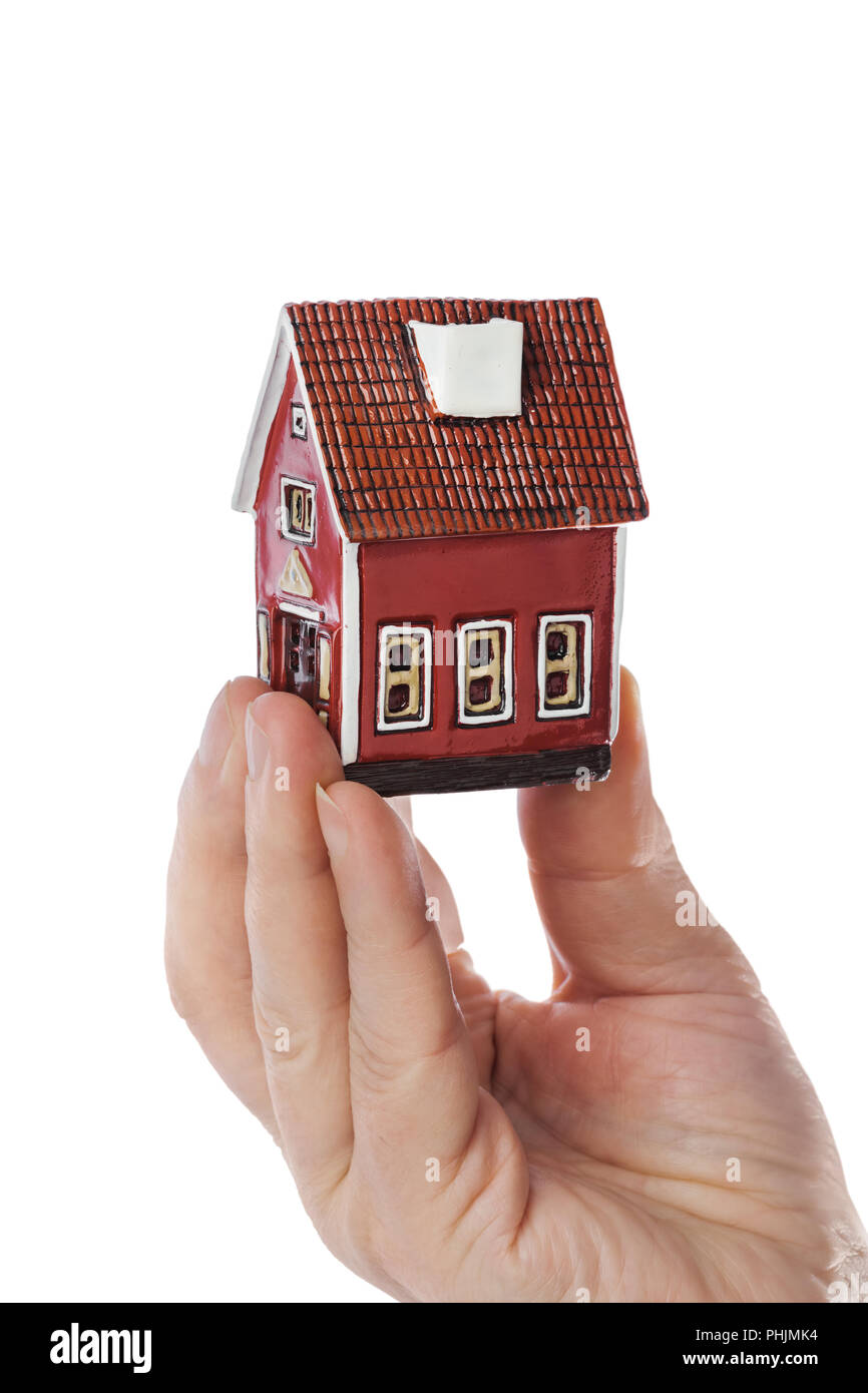 Hand and house Stock Photo - Alamy