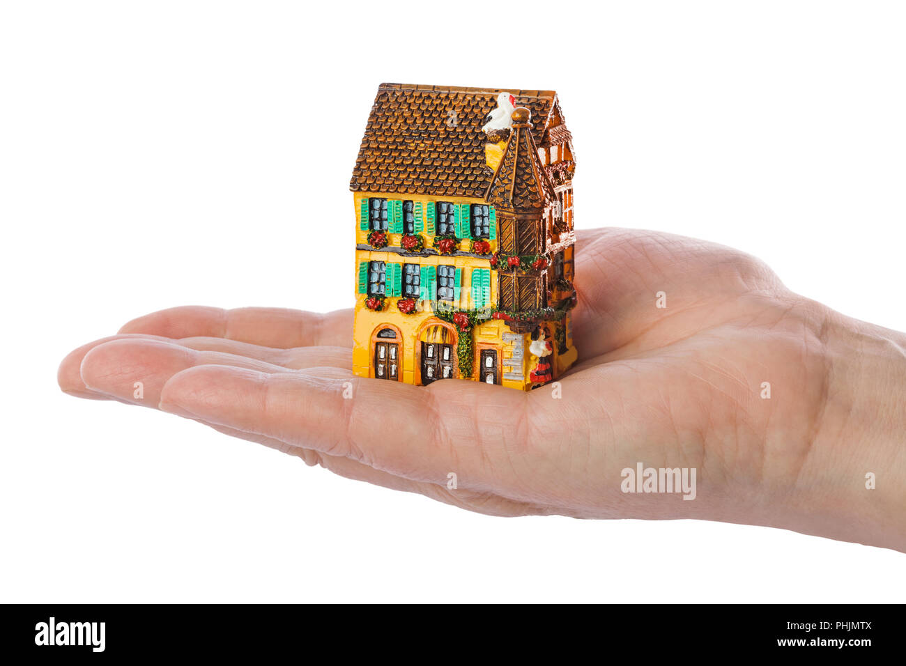 Hand and house Stock Photo - Alamy