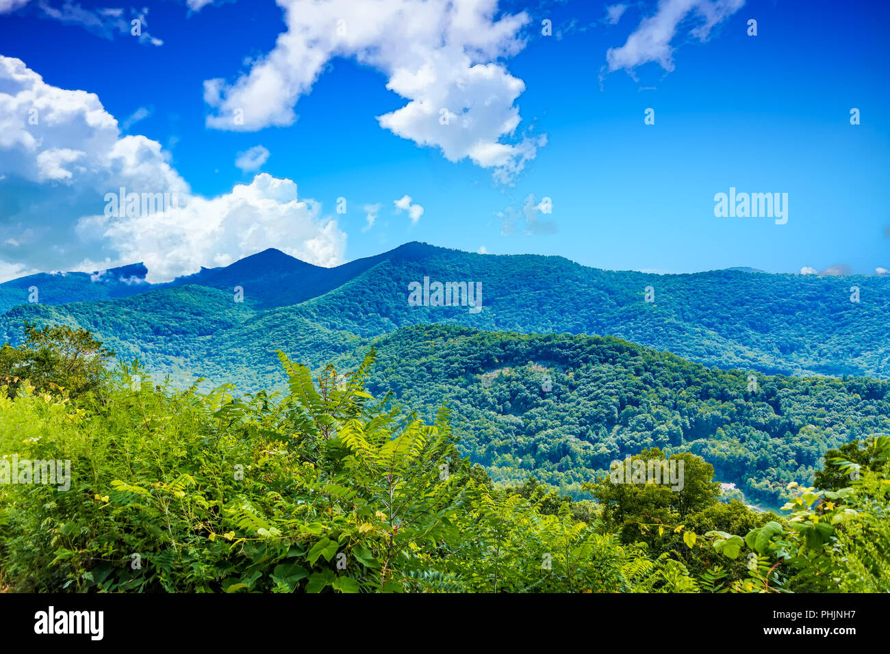 Blue Ridge Foothills with White Puffy Clouds Stock Photo - Alamy
