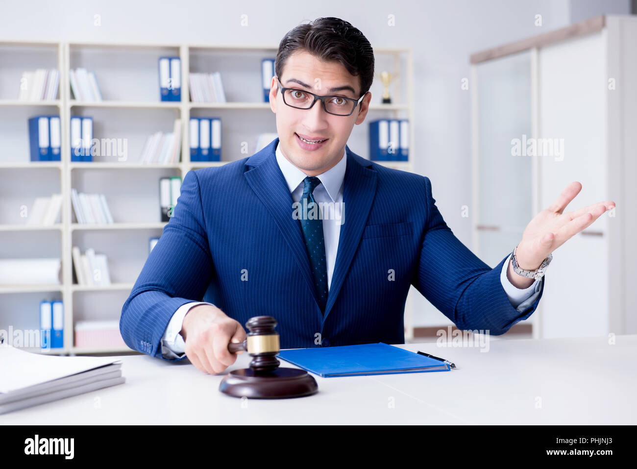 Judge smiling in courtroom hi-res stock photography and images - Alamy