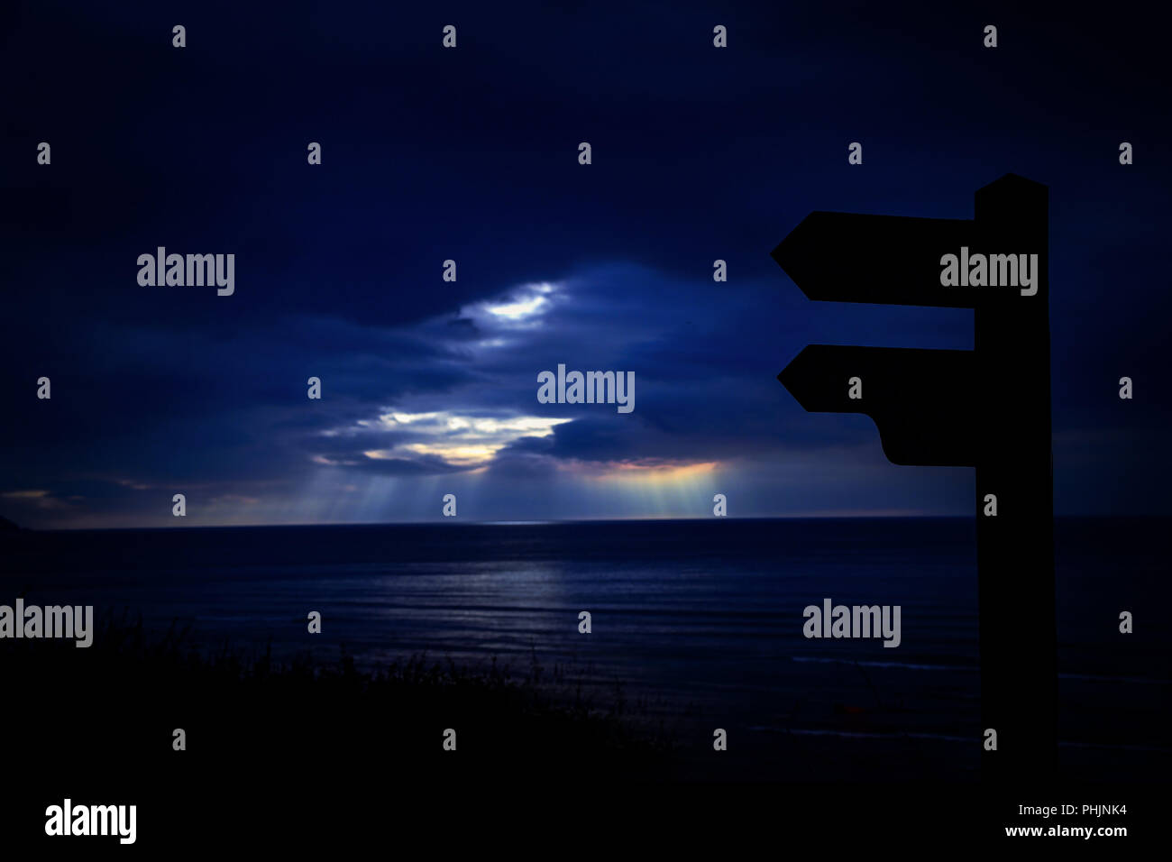 Sunrays over the sea hi-res stock photography and images - Alamy