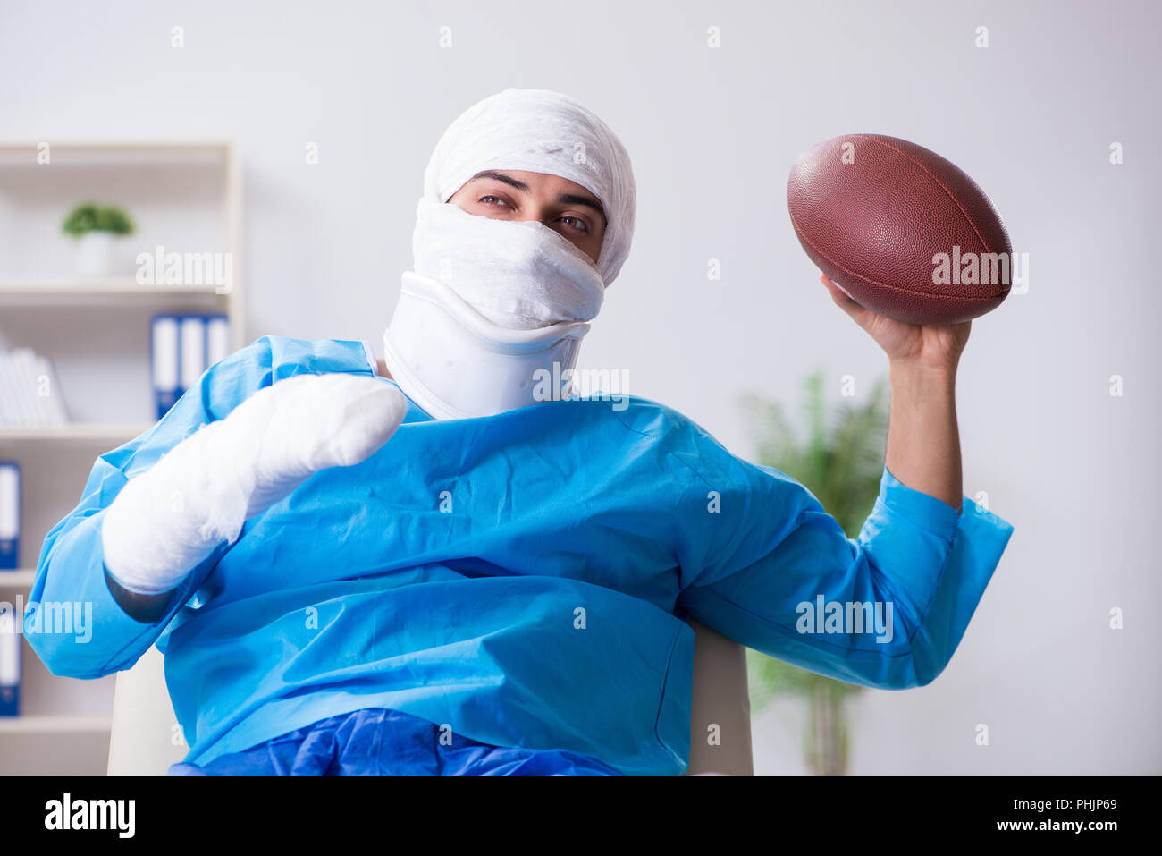 Injured american football player recovering in hospital Stock Photo - Alamy