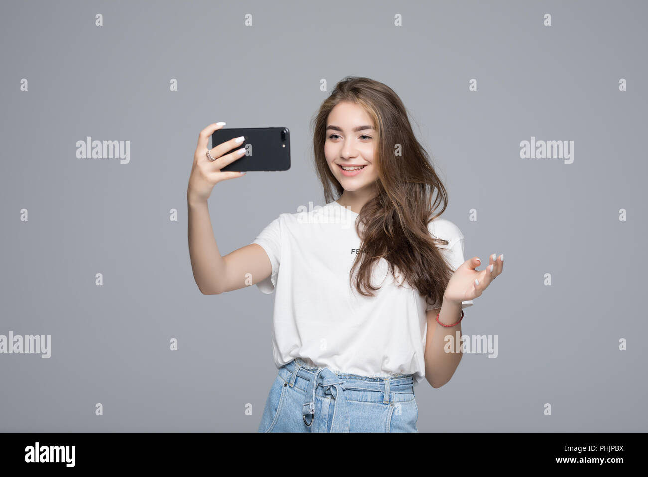 Joyful young women making selfie hi-res stock photography and images ...