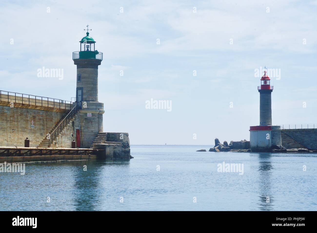 Two lighthouses, seen from the harbor Stock Photo - Alamy
