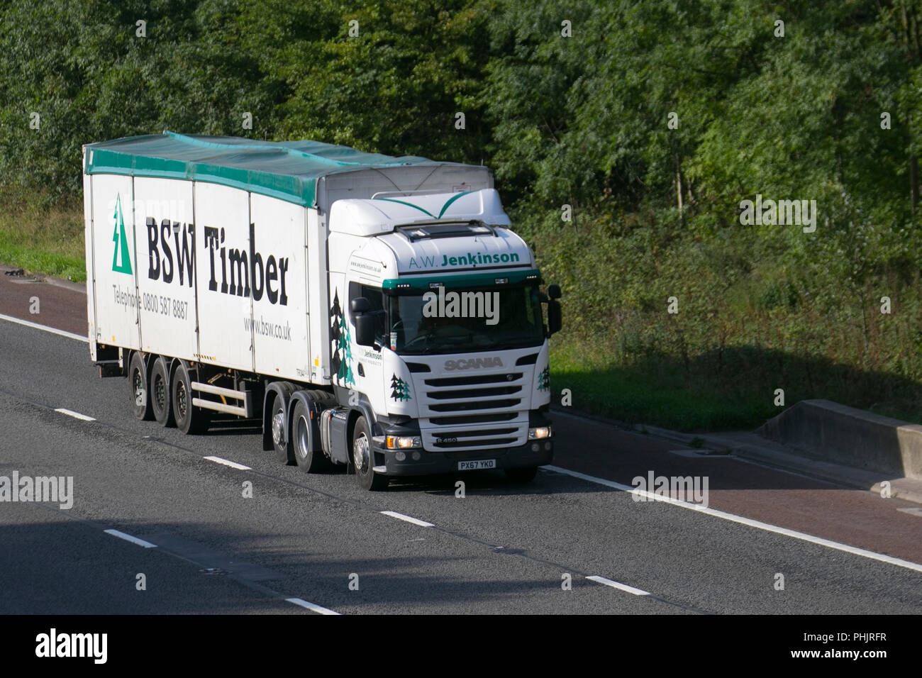 Timber lorry driving highway hi-res stock photography and images - Alamy