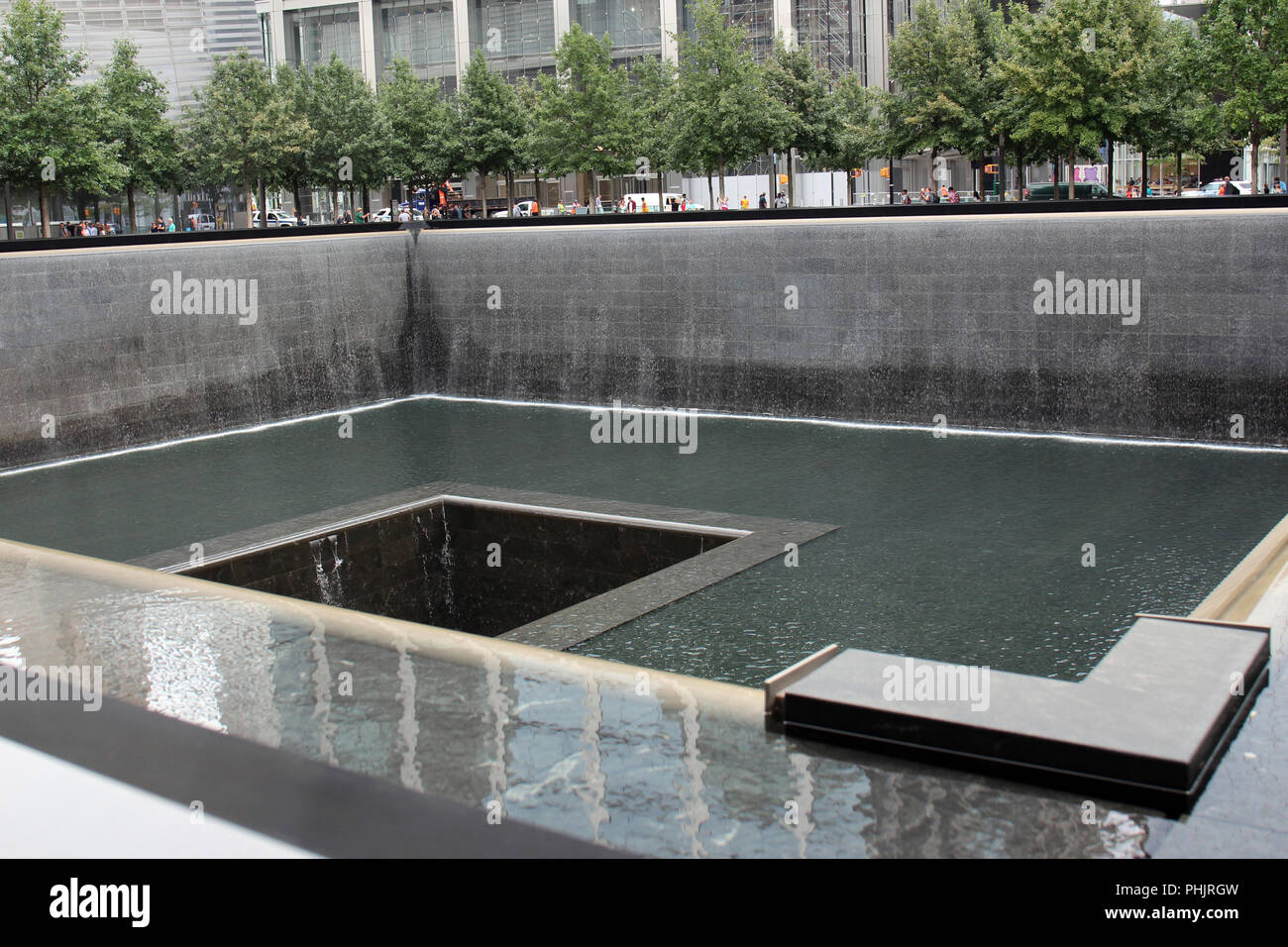 One of the reflecting pools of the National September 11 Memorial in ...