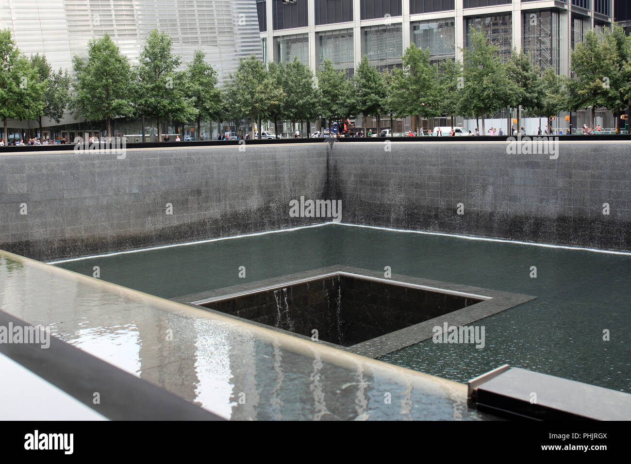 One of the reflecting pools of the National September 11 Memorial in ...