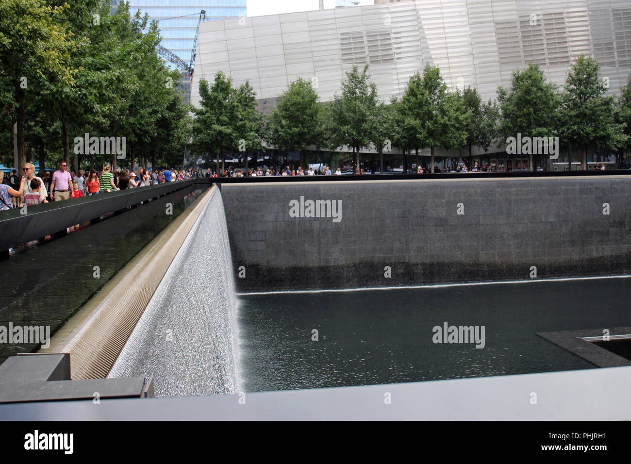 Two sides of one of the reflecting pools of the National September 11 ...