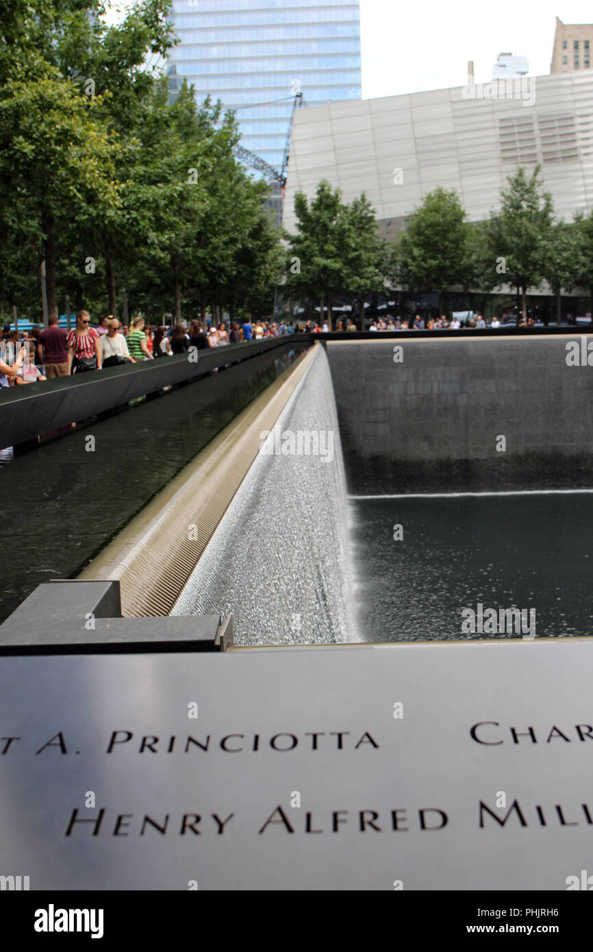 Two sides of one of the reflecting pools of the National September 11 ...