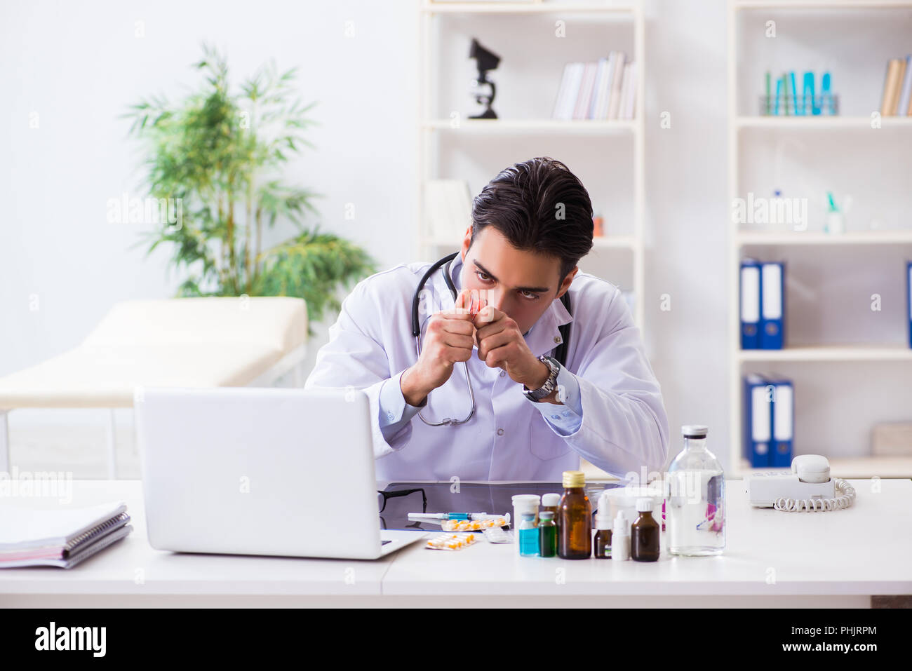 Doctor drug addict in the hospital Stock Photo - Alamy