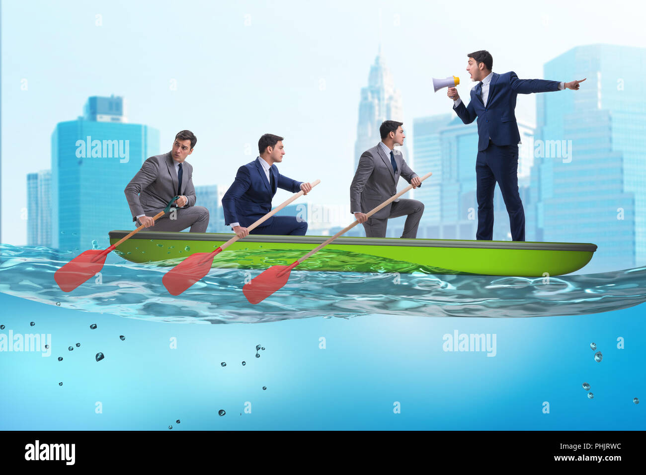 Team of businessmen in teamwork concept with boat Stock Photo - Alamy