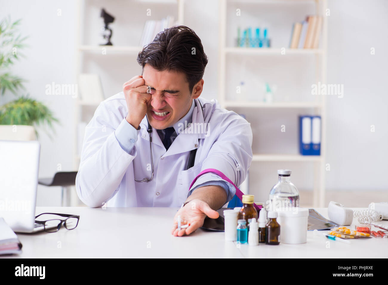 Doctor drug addict in the hospital Stock Photo - Alamy