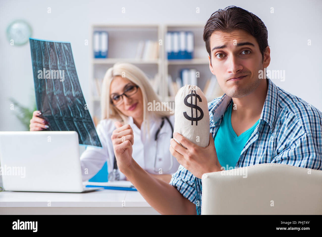 Male patient angry at expensive healthcare bill Stock Photo - Alamy