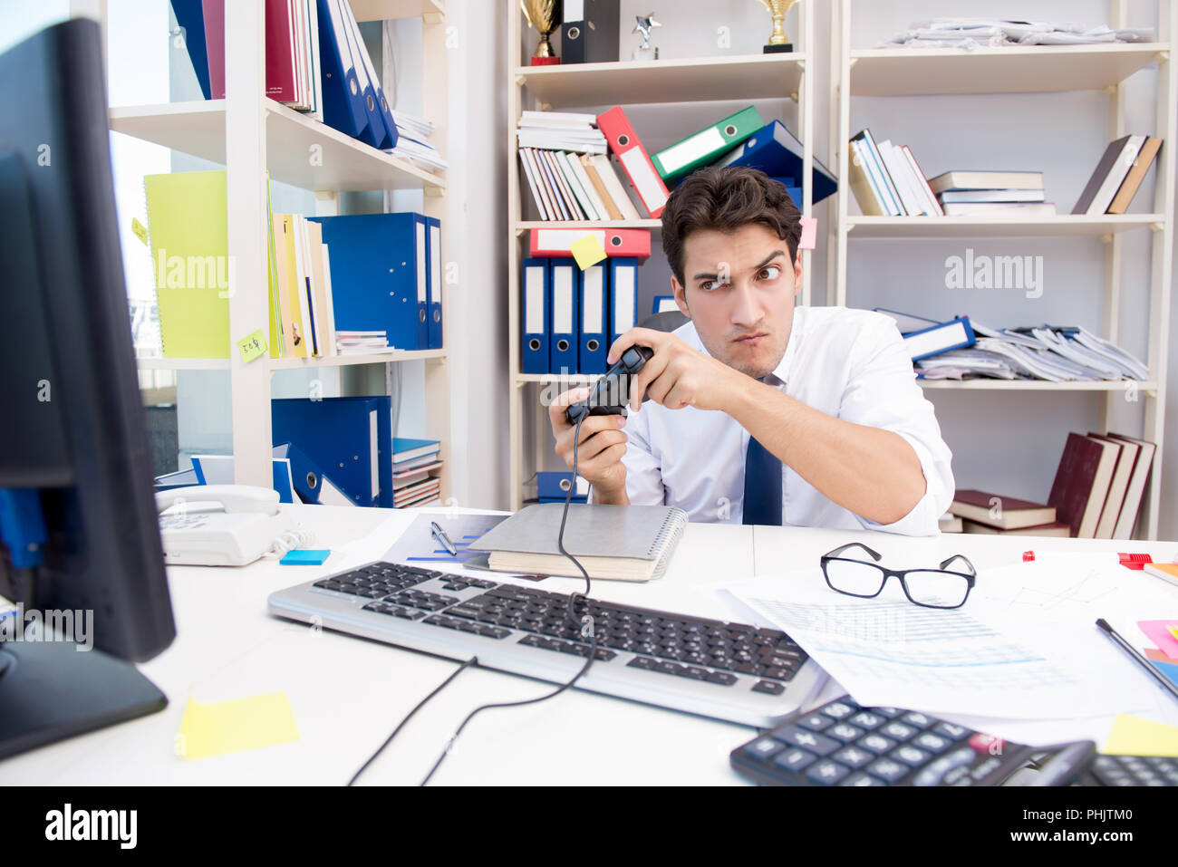 Employee playing computer games in the office Stock Photo - Alamy