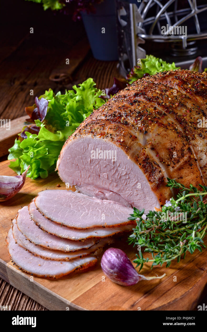 cooked ham with colorful pfefer Stock Photo - Alamy