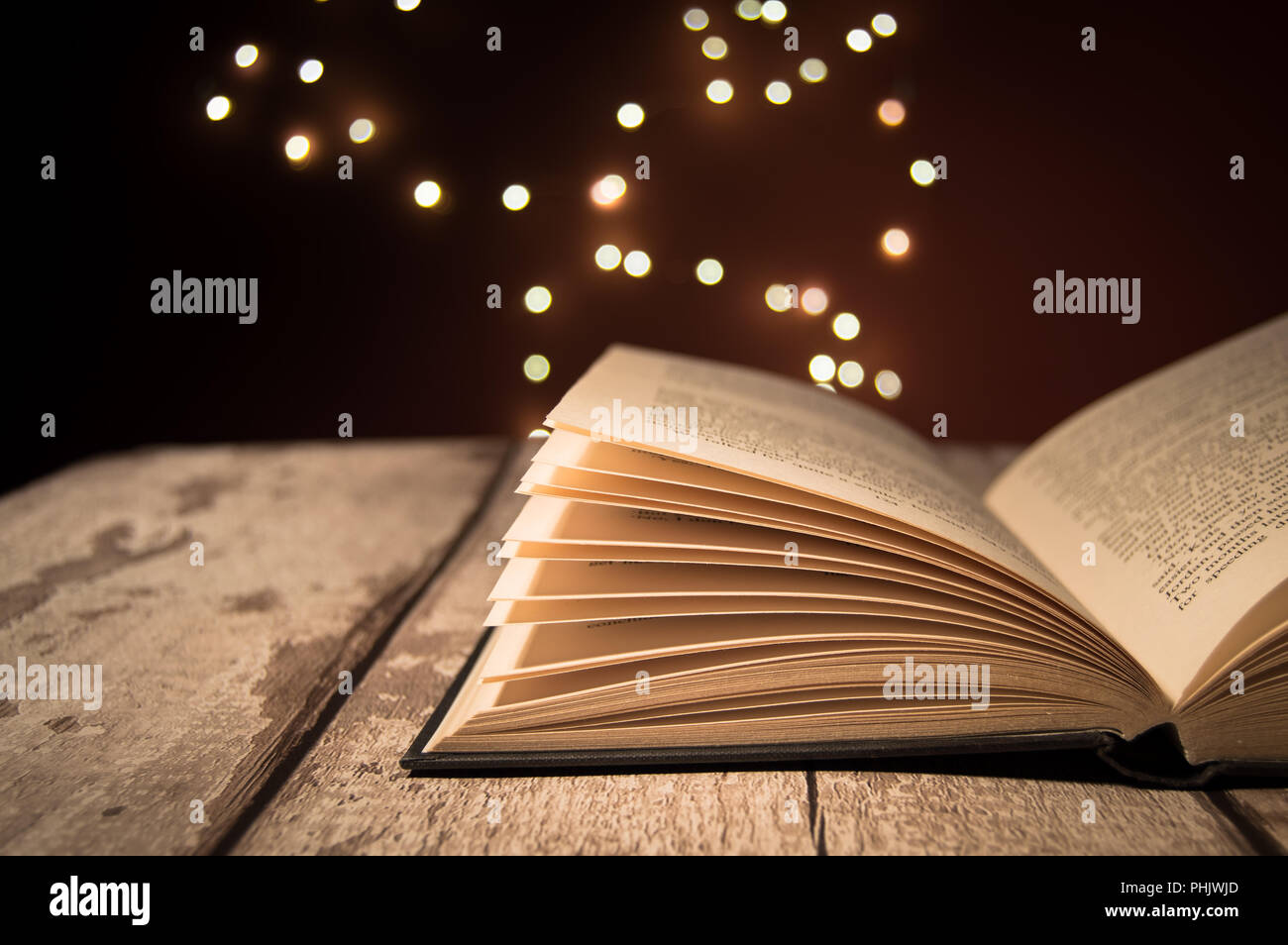 quiet book reading with bokeh Stock Photo - Alamy