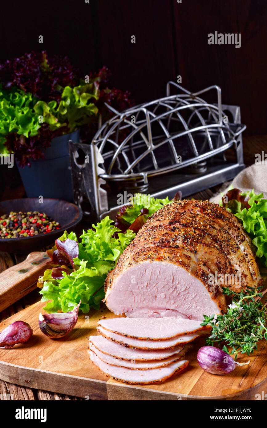 cooked ham with colorful pfefer Stock Photo - Alamy