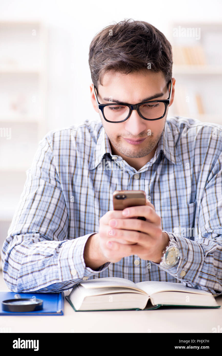 Teenager texting classroom hi-res stock photography and images - Alamy