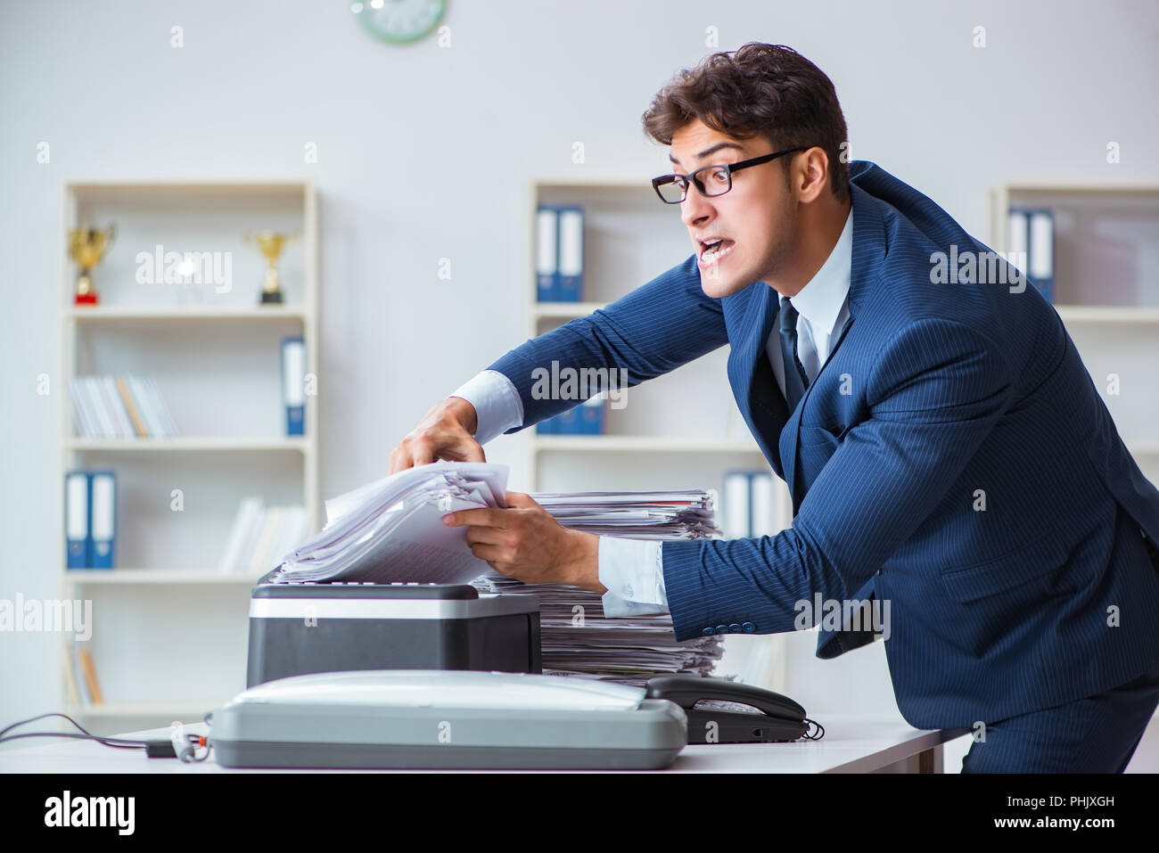 The businessman making copies in copying machine hi-res stock ...