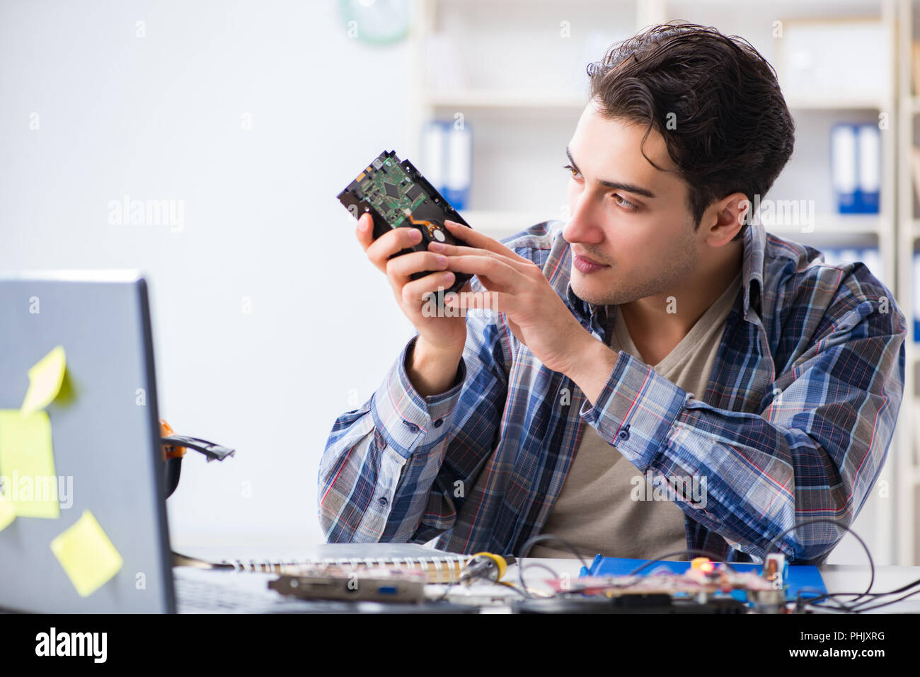 Computer hardware repair and fixing concept by experienced techn Stock ...