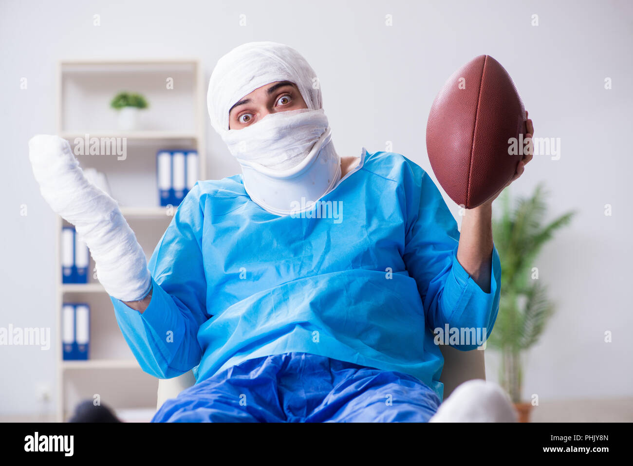 Injured american football player recovering in hospital Stock Photo - Alamy