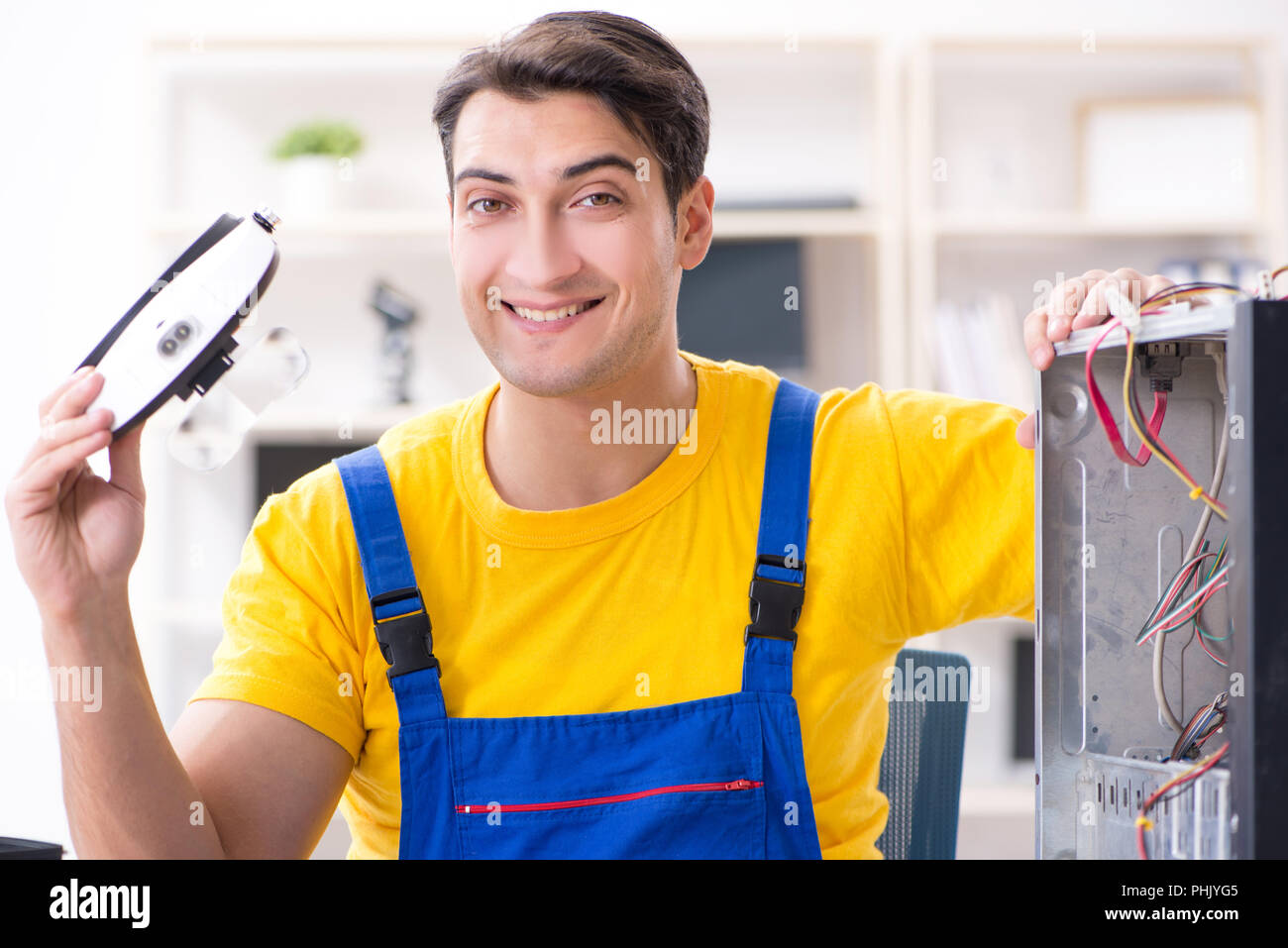 Computer repair technician repairing hardware Stock Photo - Alamy