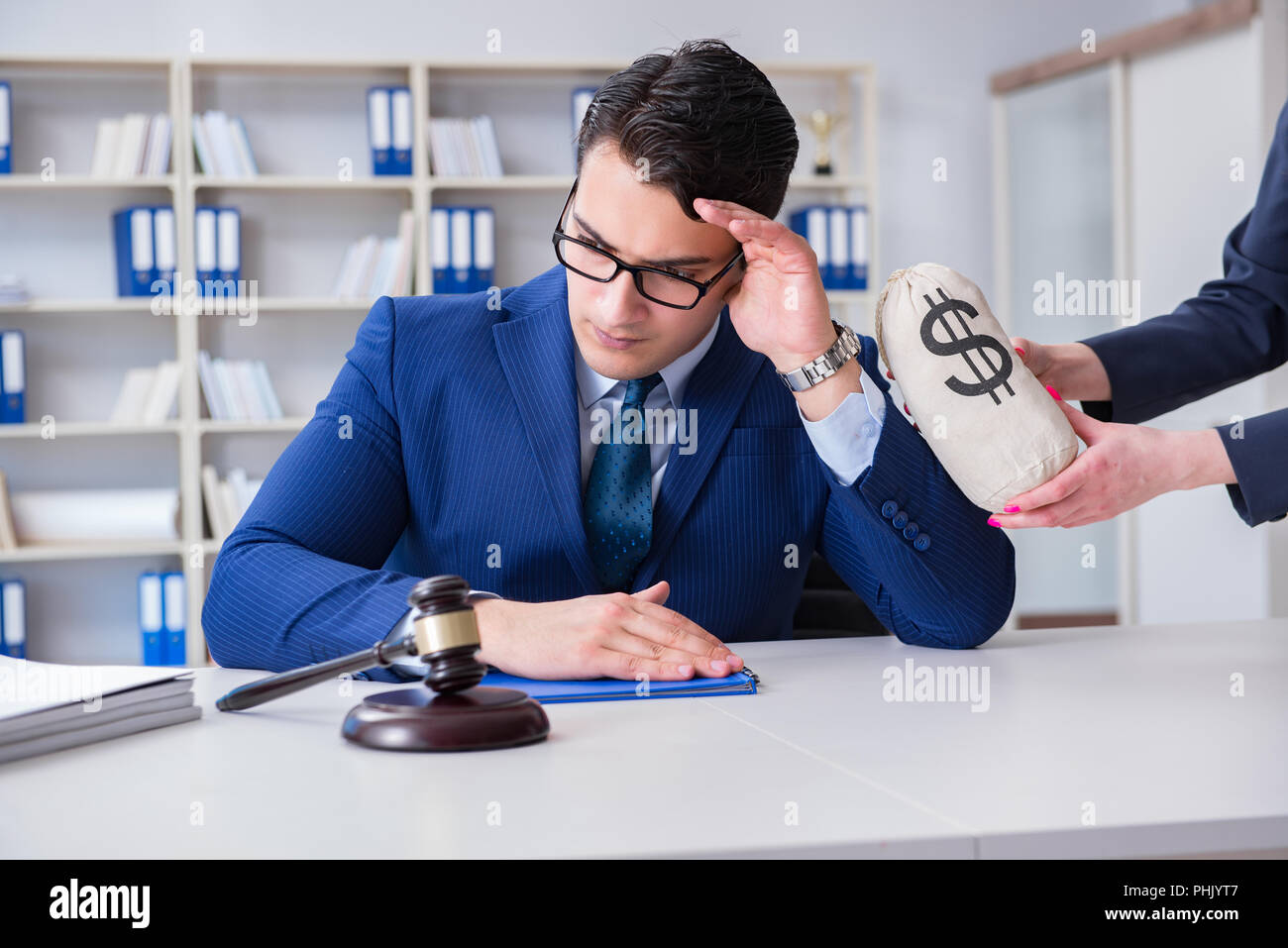 Judge in bribe concept with money Stock Photo - Alamy