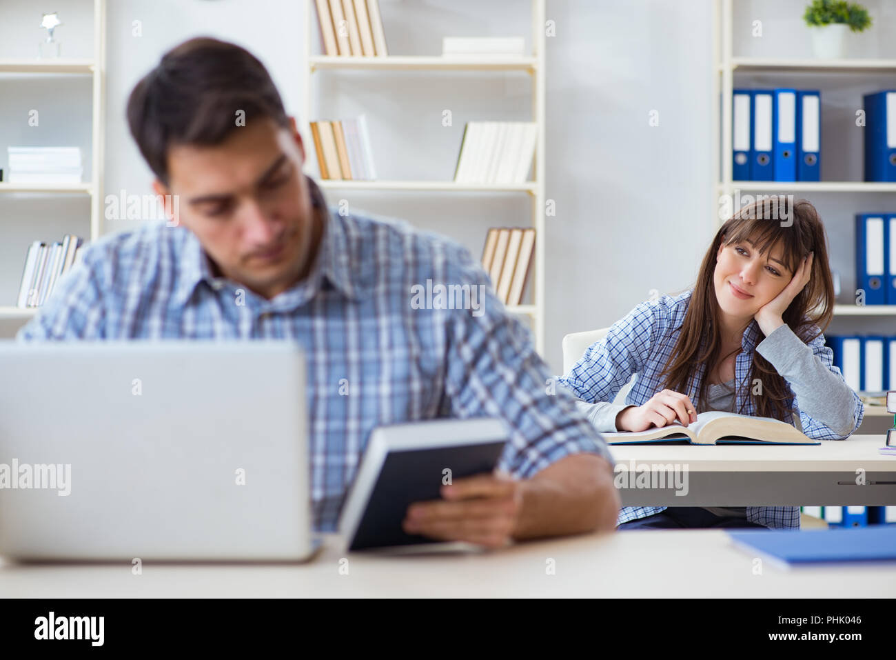 Students sitting and studying in classroom college Stock Photo - Alamy