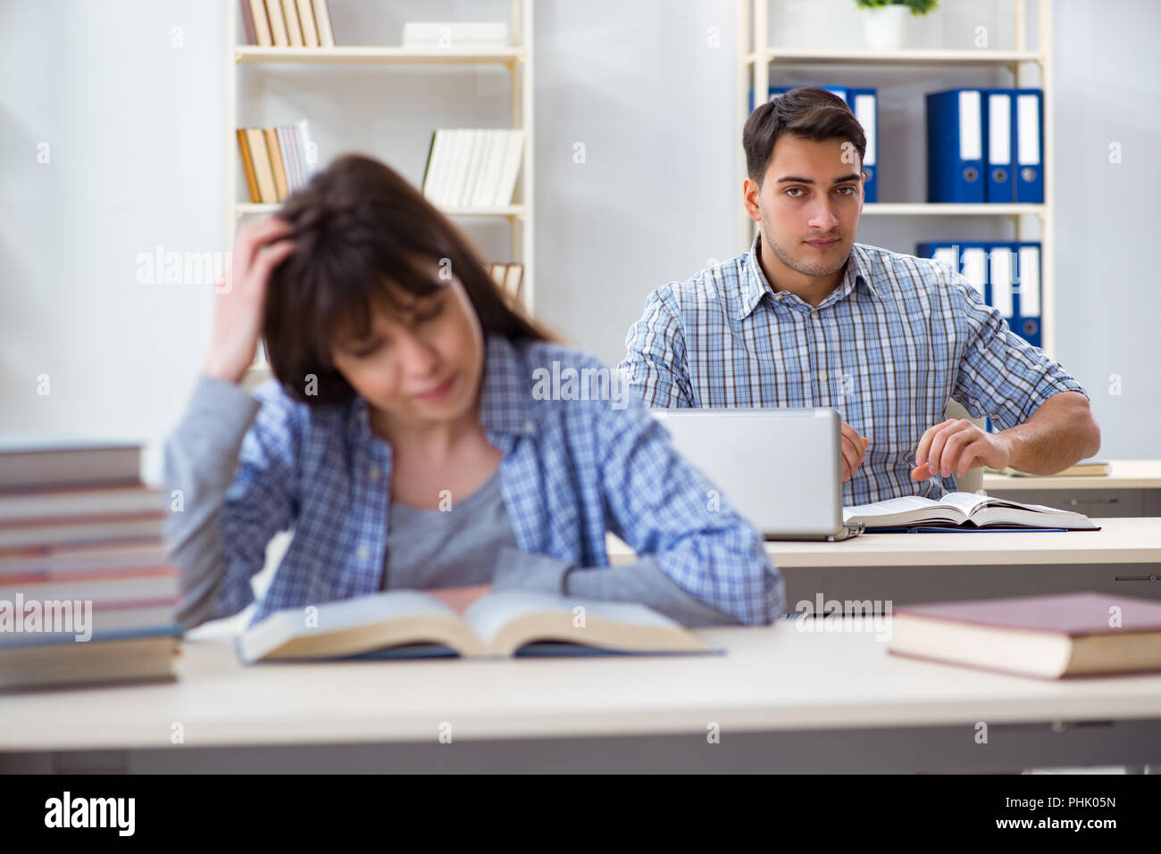 Students sitting and studying in classroom college Stock Photo - Alamy