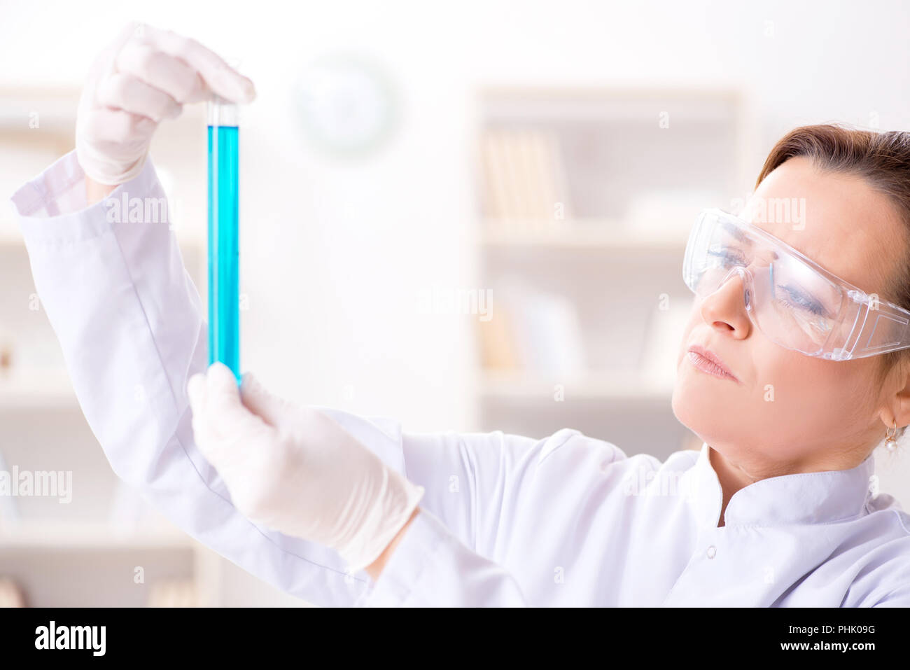 Woman chemist working in hospital clinic lab Stock Photo - Alamy