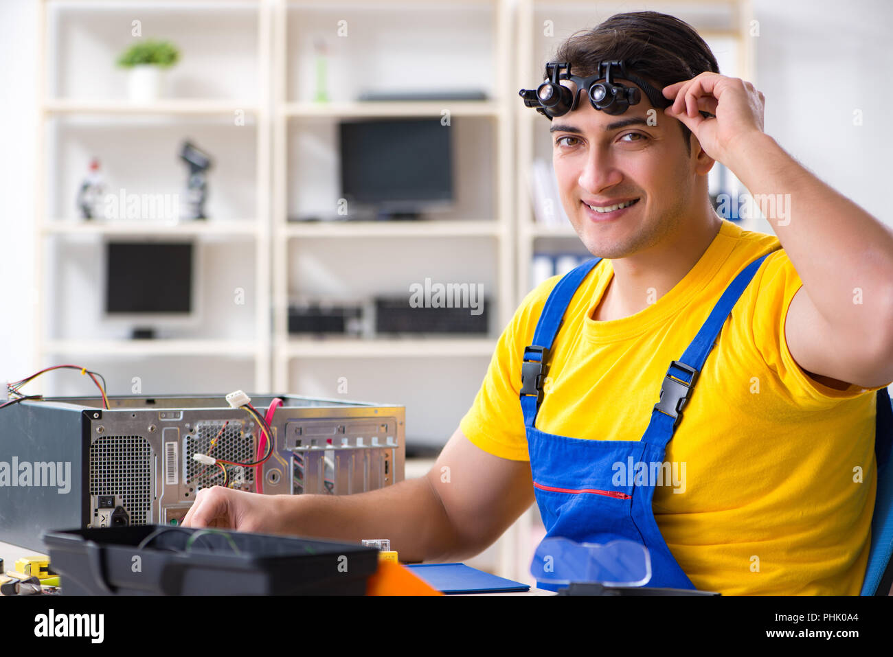 Computer repair technician repairing hardware Stock Photo - Alamy