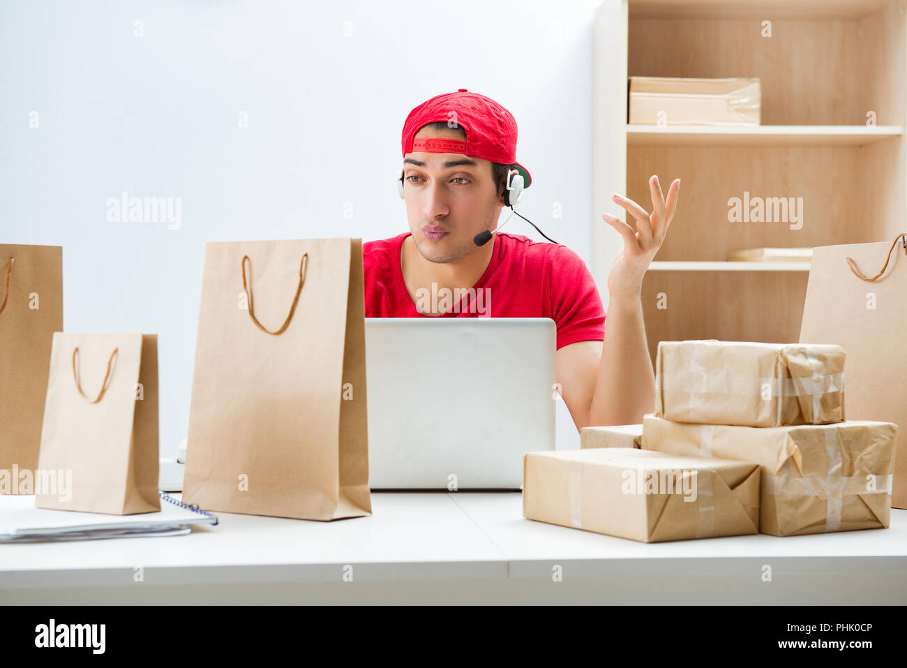 Call center worker at parcel distribution center in post office Stock ...