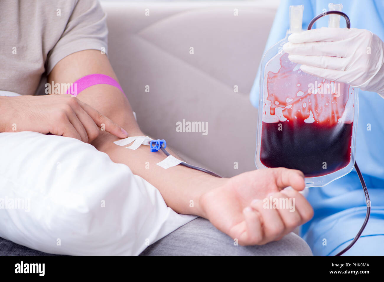Patient getting blood transfusion in hospital clinic Stock Photo - Alamy