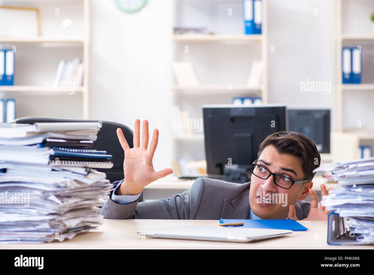 Overloaded work employee under hi-res stock photography and images - Alamy